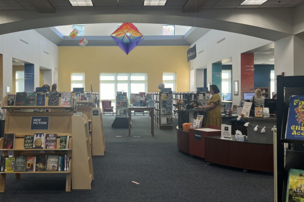 » Syracuse Librarian Inspires Young Readers During National Book Month